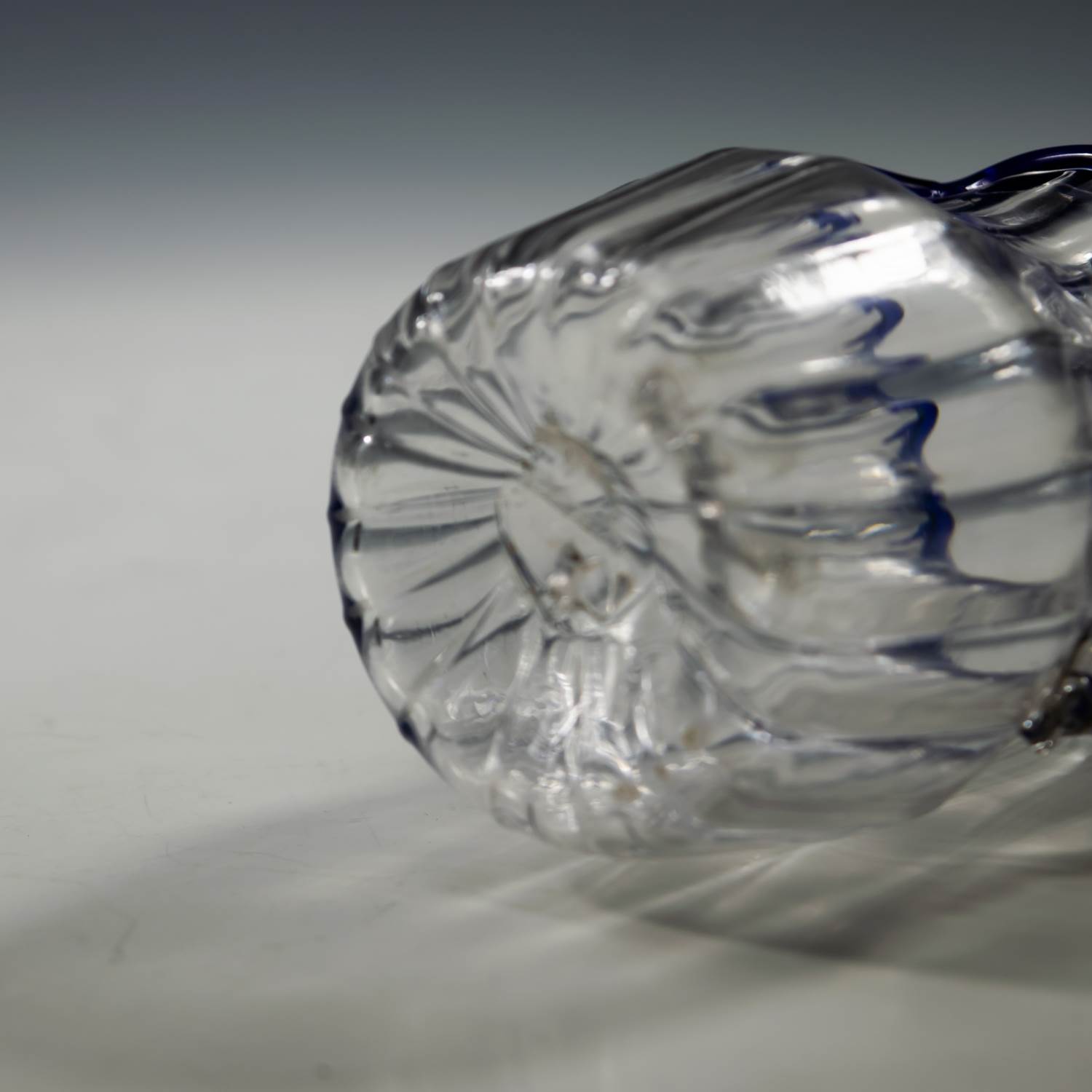 A Georgian Blue Rimmed Ribbed Glass Jug c1790
