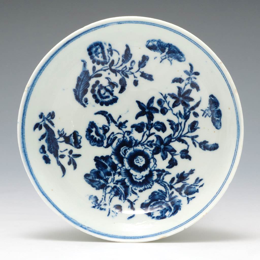A Lowestoft “Three Flowers Pattern” Tea Bowl and Saucer c1775