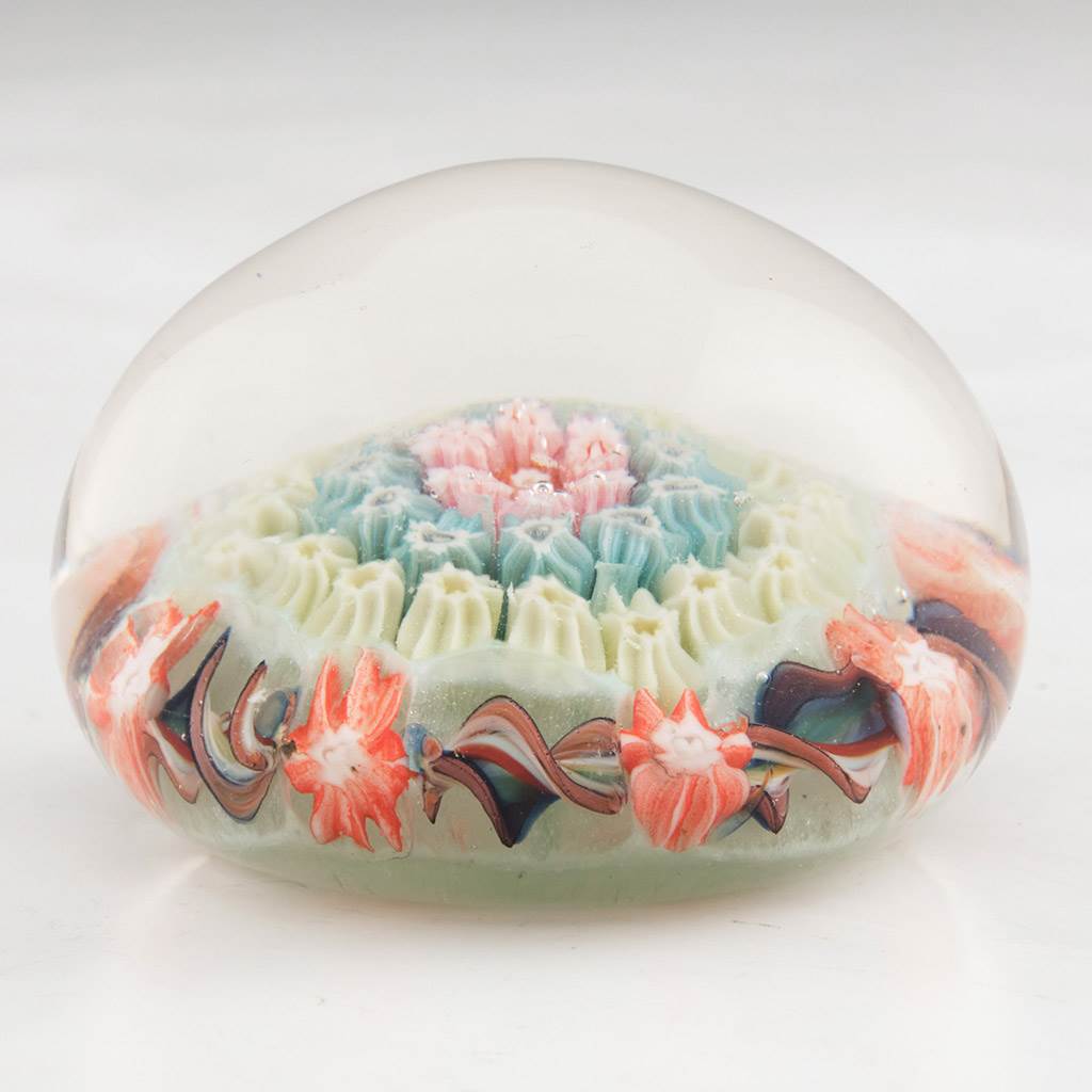 A Vasart Four Row Concentric Paperweight With Outer Row Of Latticino ...
