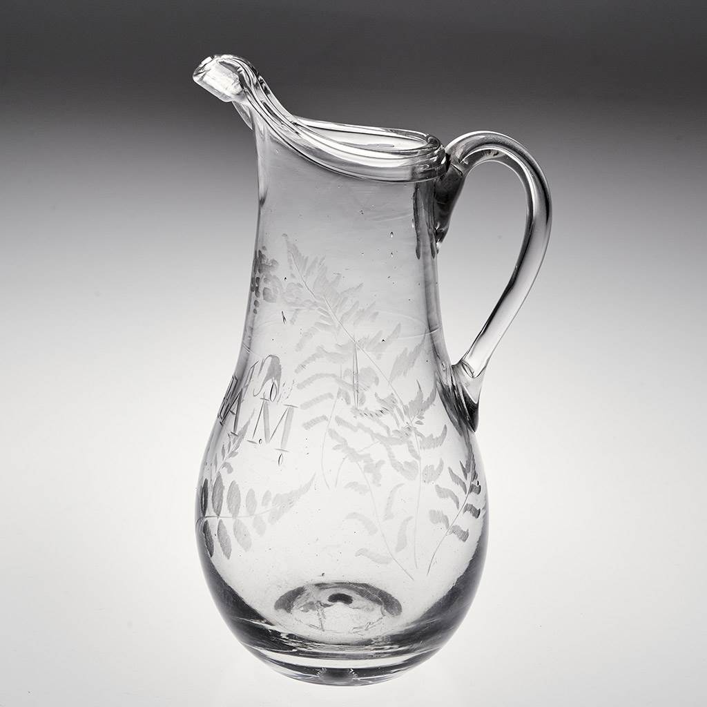 An Engraved Glass Cream Jug c1820
