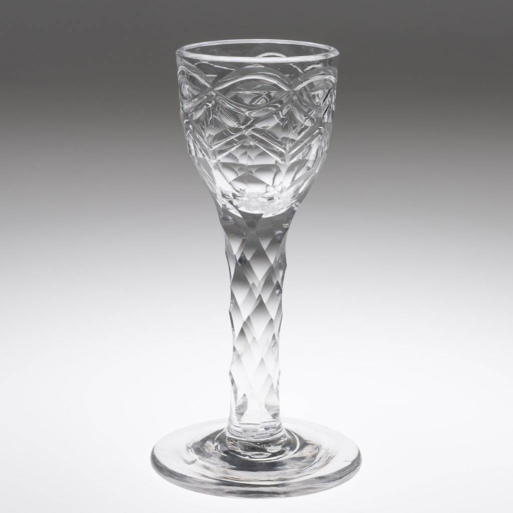 A Vesica Cut Wine Glass With facet Cut Stem c1780