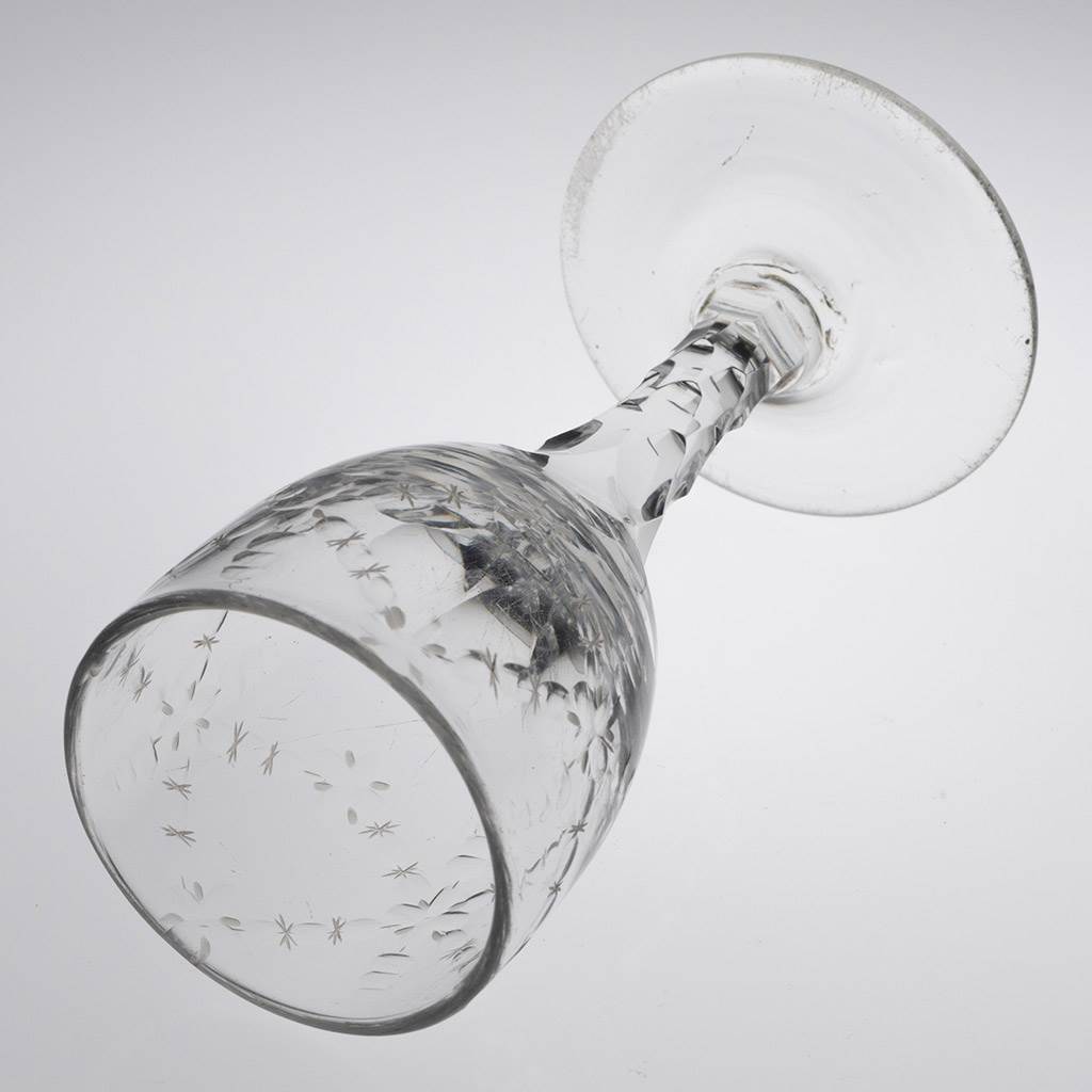 An Engraved and Polished Facet Cut Stem Port Glass c1800