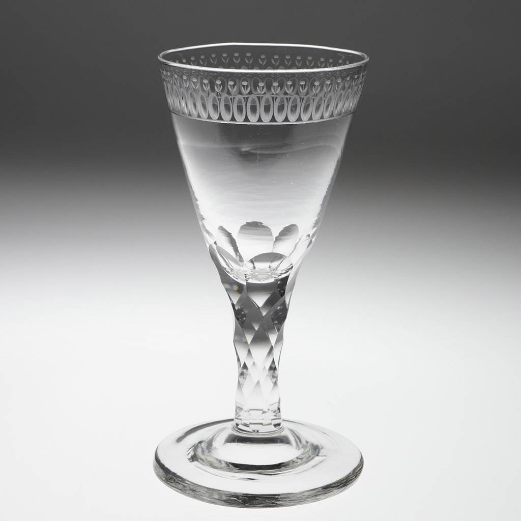 A Large Engraved Georgian Facet Cut Stem Wine Glass c1780